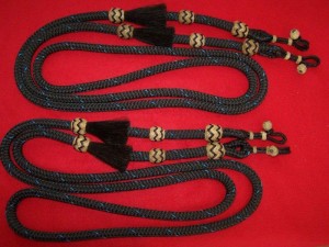 Braided nylon roping reins with horsehair tassels and rawhide knots and ...